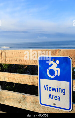 Disabled handicapped wheelchair clifftop viewing area sign on the coast ...