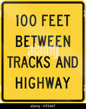 100 feet between tracks and highway warning sign Stock Photo - Alamy
