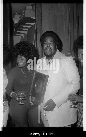 Barry White American soul singer arriving at Heathrow Airport with his ...