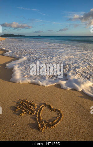 A hashtag drawn in the sand on a beach Stock Photo - Alamy