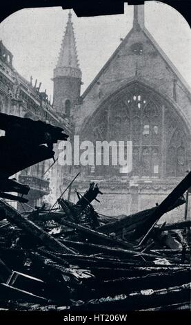 City of London Blitz bomb damage. A ground level view with the spire of ...