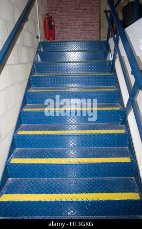Industrial blue and yellow metal stairs for a tequila factory Stock ...