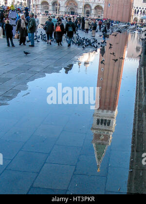 Reflections of Acqua Alta in Piazza San Marco showcasing Venetian ...