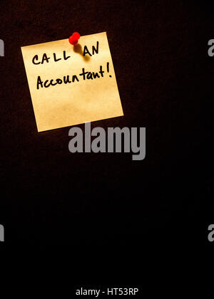 call an accountant, post it note on white, portrait orientation Stock ...