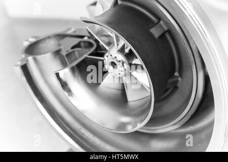 Turbocharger structure with cross section, black and white photo with ...