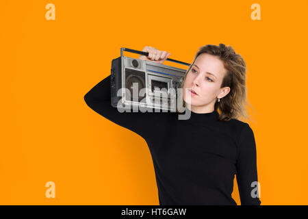 Caucasian Lady Holding Jukebox Neutral Stock Photo - Alamy
