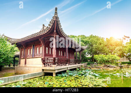 Traditional Chinese ancient buildings, a pond and duckweed Stock Photo ...