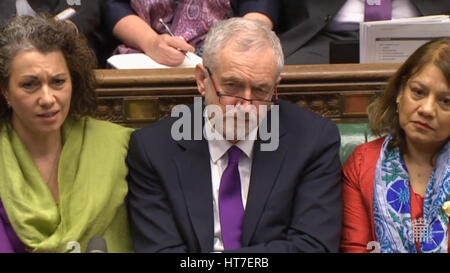 Labour leader Jeremy Corbyn listens in as Chancellor Philip Hammond ...