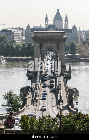 Budapest, Hungary, May 21, 2009: People on escalators in metro station ...