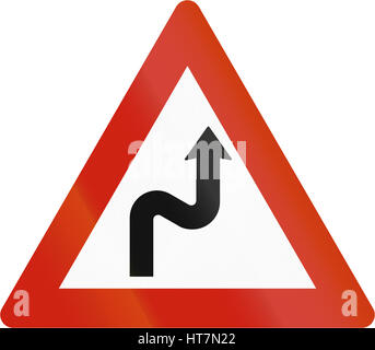 Reverse curve warning sign Stock Photo - Alamy