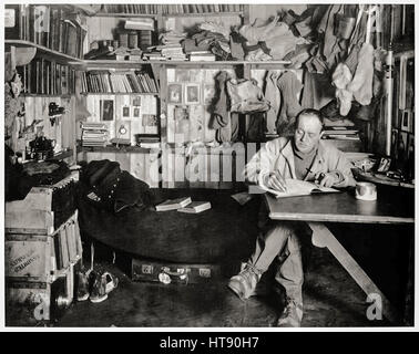 Captain Robert Falcon Scott writing in his diary in his hut at Cape ...