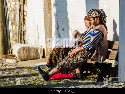 Two elderly Turkish women sitting outside the Mosque at Konya Stock ...