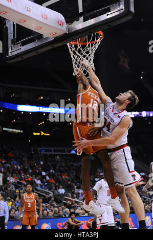Texas guard Kerwin Roach Jr. (12) drives inside and shoots over TCU forward Devonta Abron (23 ...