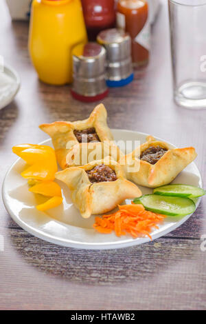 Oriental pizza plate of traditional Arabic food manaqish Stock Photo ...