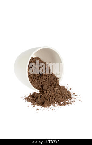 Overturned terracotta flower pot with soil and plant isolated on white ...