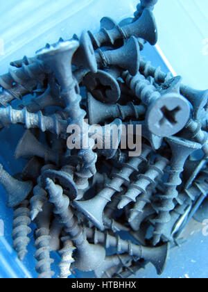 group of gray screws, stacked Stock Photo - Alamy