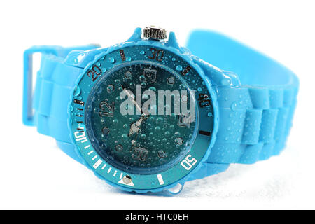 wet blue wristwatch isolated on white background Stock Photo - Alamy