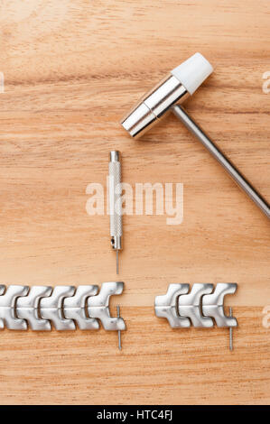 adjusting the watch bracelet with pin punch, tool for watch Stock Photo ...