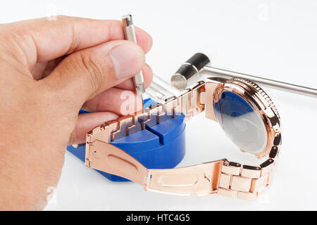 adjusting the watch bracelet with pin punch, tool for watch Stock Photo ...
