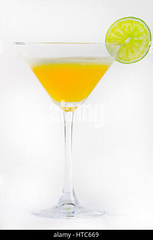 Yellow bird cocktail with white rum, liquor and lime juice in martini ...