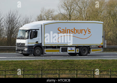 White hgv juggernaut lorry truck driver & blue Furniture Village ...