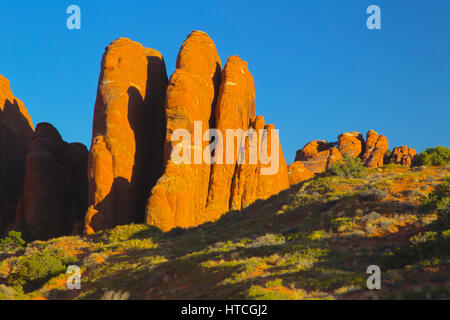Massive red rock formations in the summertime at Arches National ...