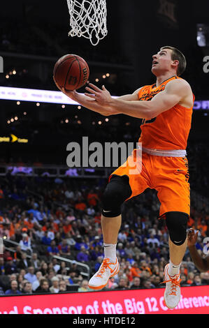 Oklahoma State guard Phil Forte (13) shoots as Maryland forward ...