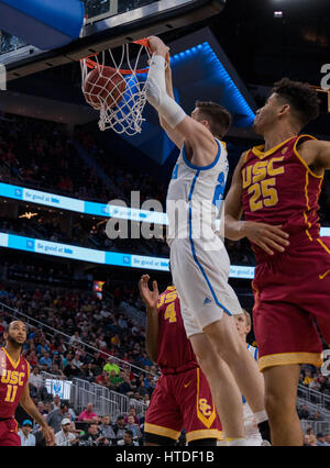 UCLA forward TJ Leaf dunks during the second half of an NCAA college ...