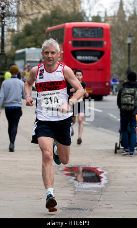 A male runner in the Teddy Hall Relays, Oxford, UK Stock Photo - Alamy