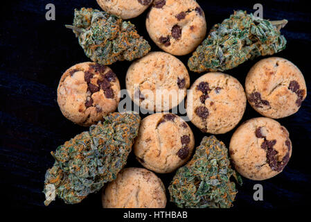 Background with cannabis nugs (forum cut cookies strain) and infused ...