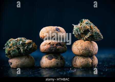 Background with cannabis nugs (forum cut cookies strain) and infused ...