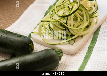 Preparing healthy spiral shredded zucchini squash Stock Photo - Alamy