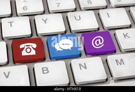 Contact us icons on white cube blocks. Copy space Stock Photo - Alamy