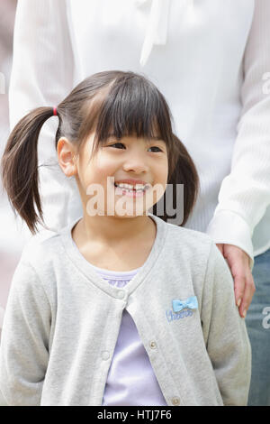 Japanese mother and daughter at a city park Stock Photo - Alamy