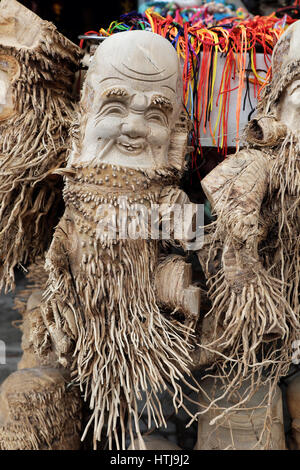 An abstract artwork with a face carved on a rock Stock Photo - Alamy
