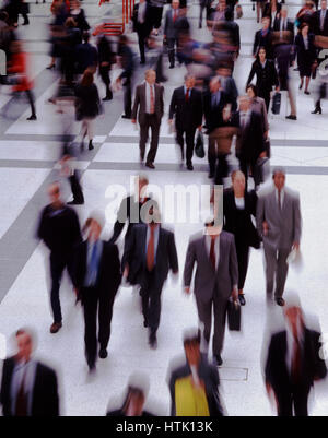 Commuters on London Bridge rushing to work in the City, London, England ...