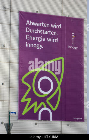 Essen, Germany. 13th Mar, 2017. A banner and the company logo for the ...