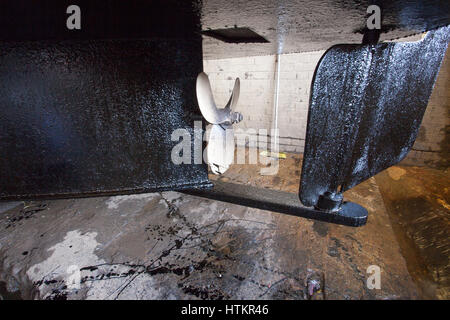 Narrow boat in dry dock for blacking Stock Photo - Alamy