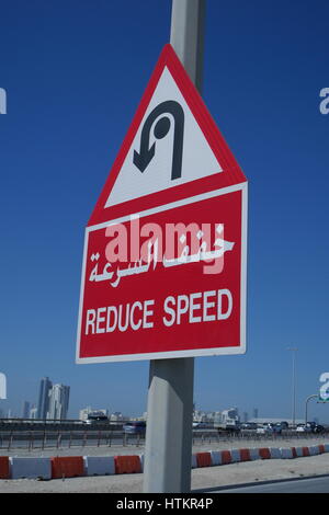 Arabic road sign warning speed limit doha qatar cars traffic busy road ...