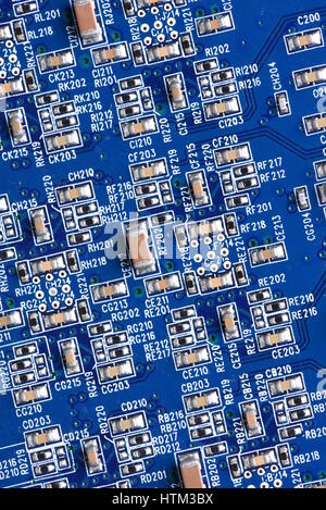 macro top view of a printed circuit board with processors, capacitors ...