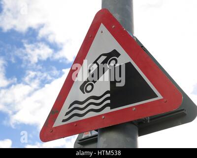uk road sign car falling into water dangerous drop sea river canal ...