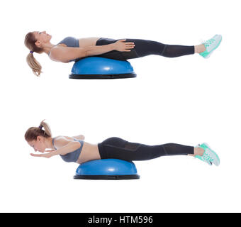 Balance training ball exercise execution with a professional trainer ...