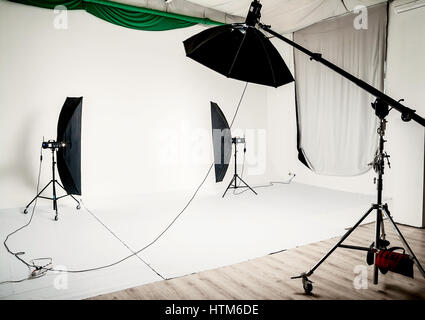 Empty photo studio with lighting equipment Stock Photo - Alamy