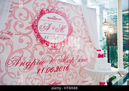 Rose and white banner photozone at wedding ceremony Stock Photo - Alamy