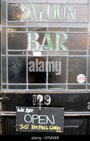 Stained glass Pub door with sign Stock Photo - Alamy
