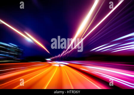 Abstract background of moving traffic light trails with circle bokeh ...