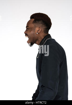 Young black guy screaming out loud Stock Photo - Alamy