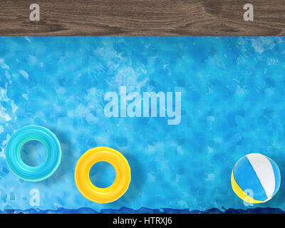 beach balls and swim rings floating on pool top view with blank space ...