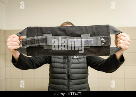 An Emergency Response Belt (ERB) that prevents a detainee from biting ...