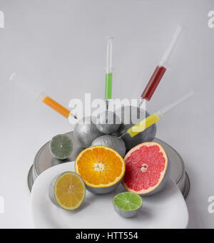 Genetically modified lime fruits with grapefruit center on white ...